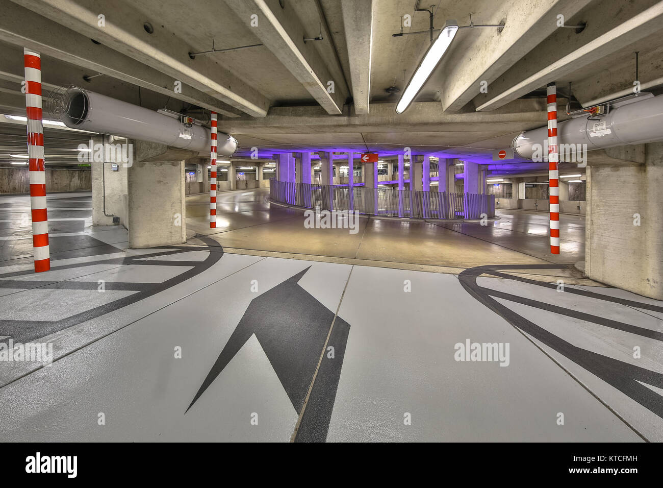 Empty circular parking garage under a sport stadium Stock Photo - Alamy