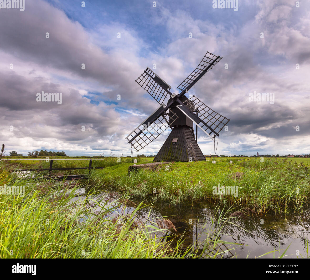 Traditional Wooden Windmill. Historic water management pump device to ...