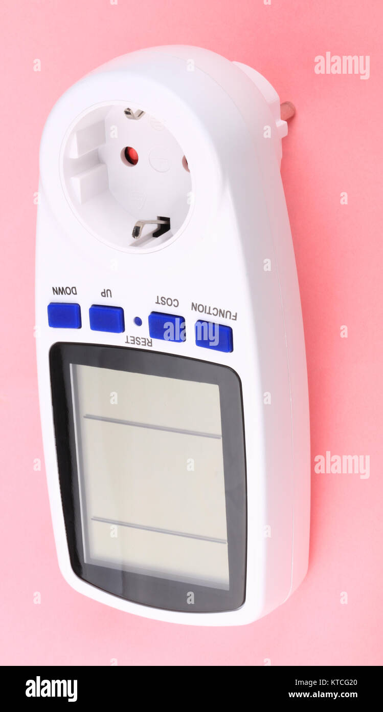 Digital Power Meter on pink background Stock Photo - Alamy