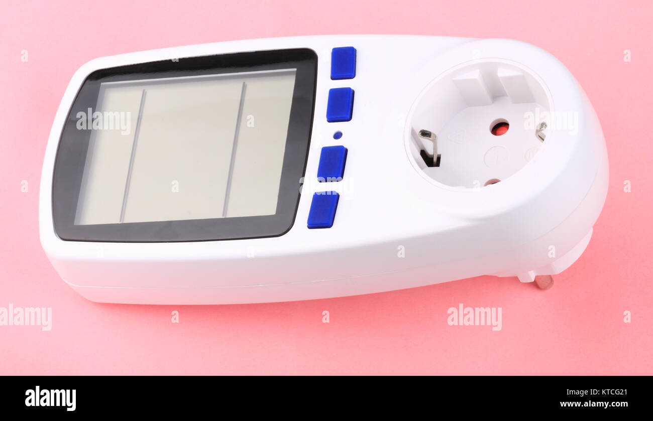 Digital Power Meter on pink background Stock Photo - Alamy