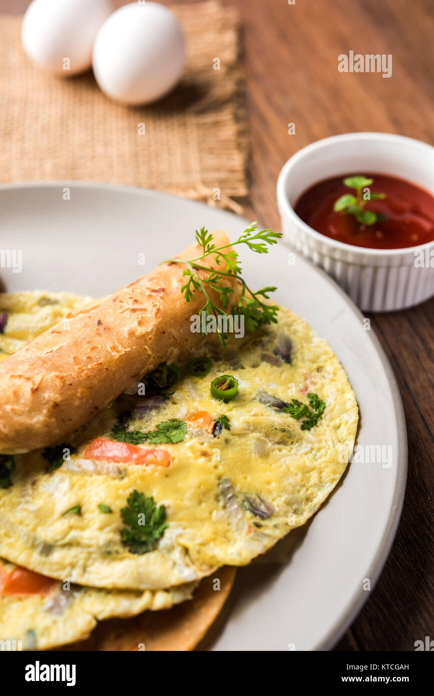 omelette / omelette chapati roll or Indian bread or roti rolled with ...