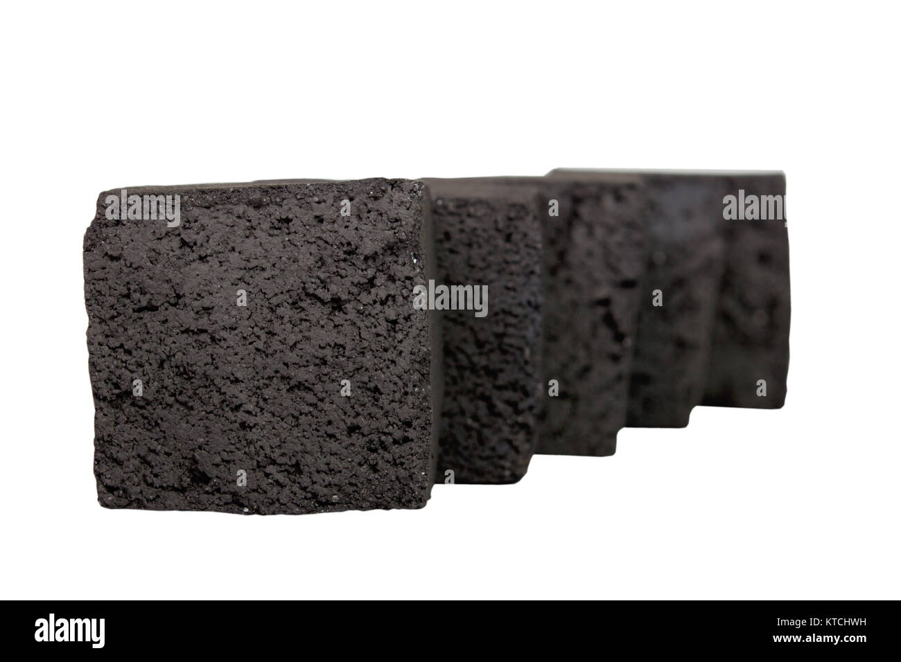 Group of charcoal cubes isolated on white background Stock Photo - Alamy