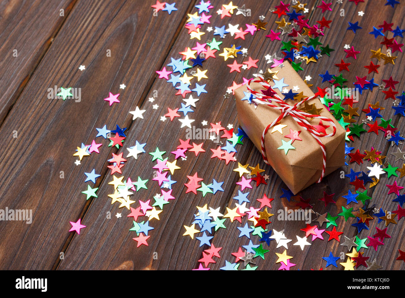 gift box with star shape decor on white wood table background Stock ...