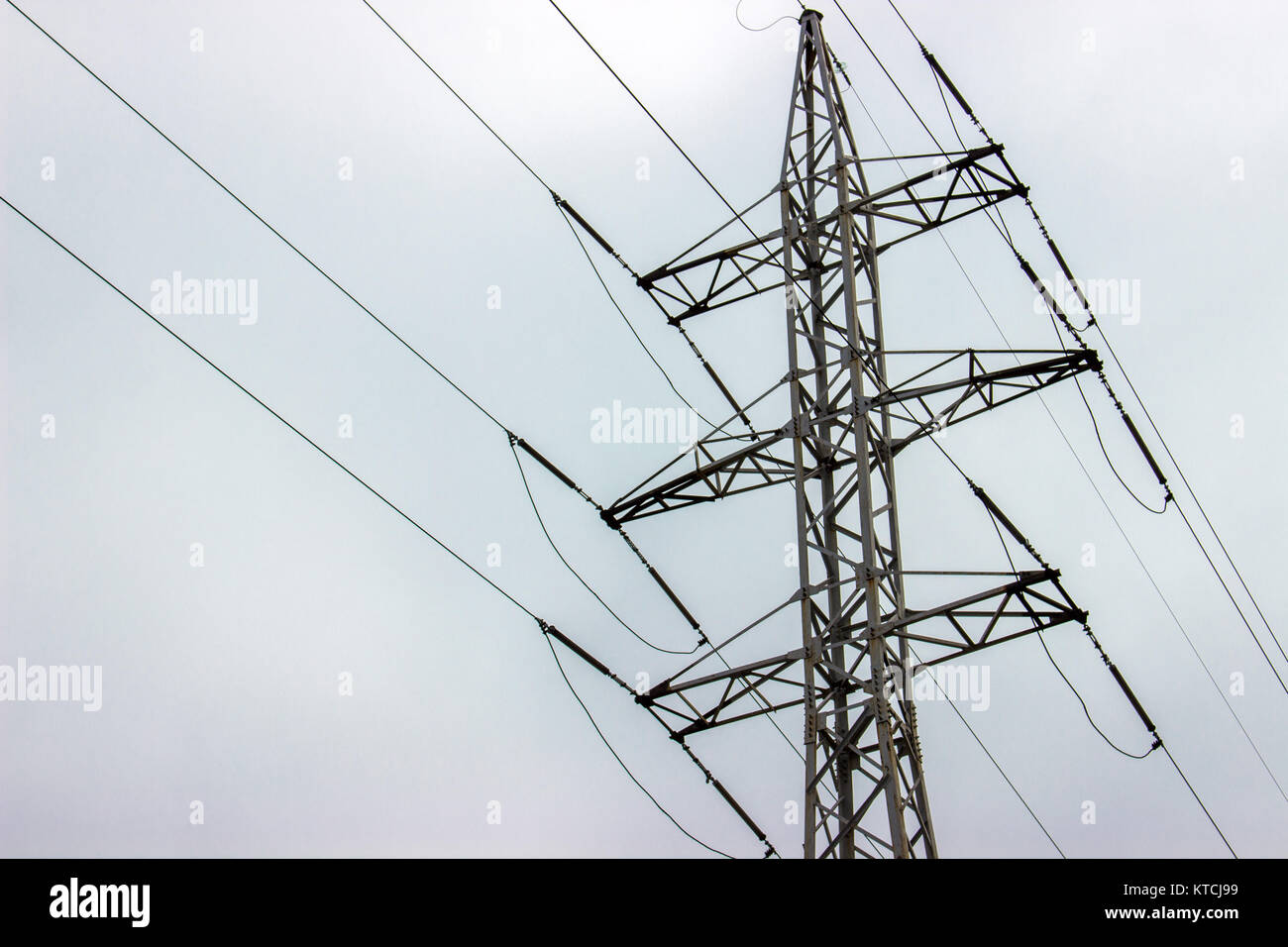 high voltage electrical towers in line. sky background Stock Photo - Alamy