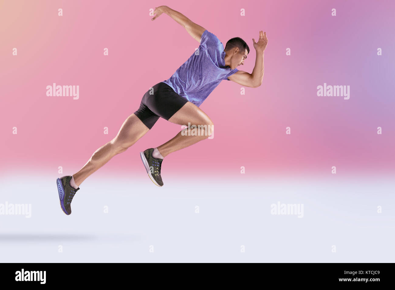 The studio shot of high jump athlete is in action Stock Photo - Alamy