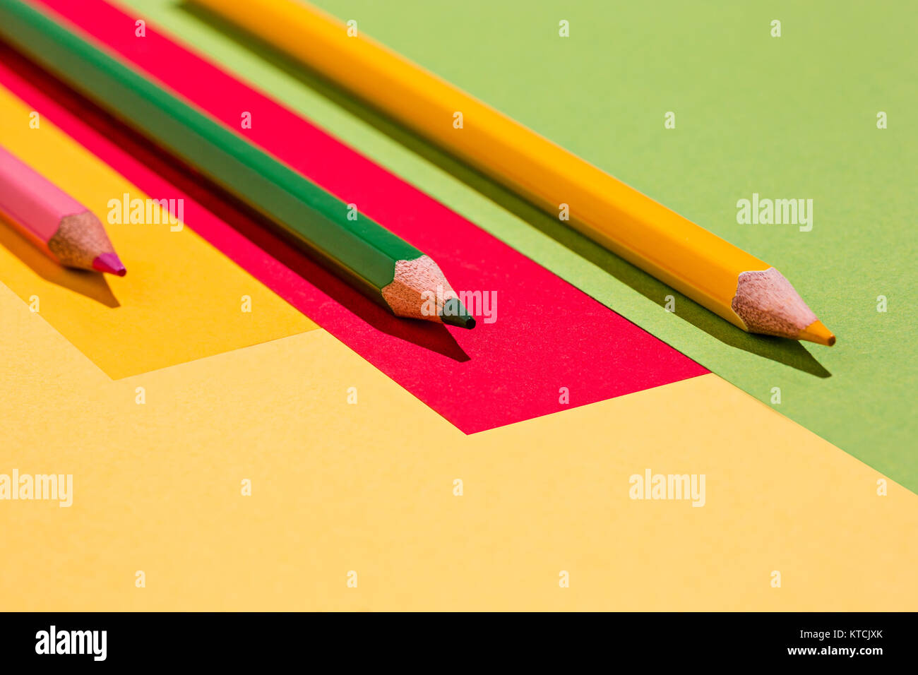 colored pencils and colour paper Stock Photo - Alamy