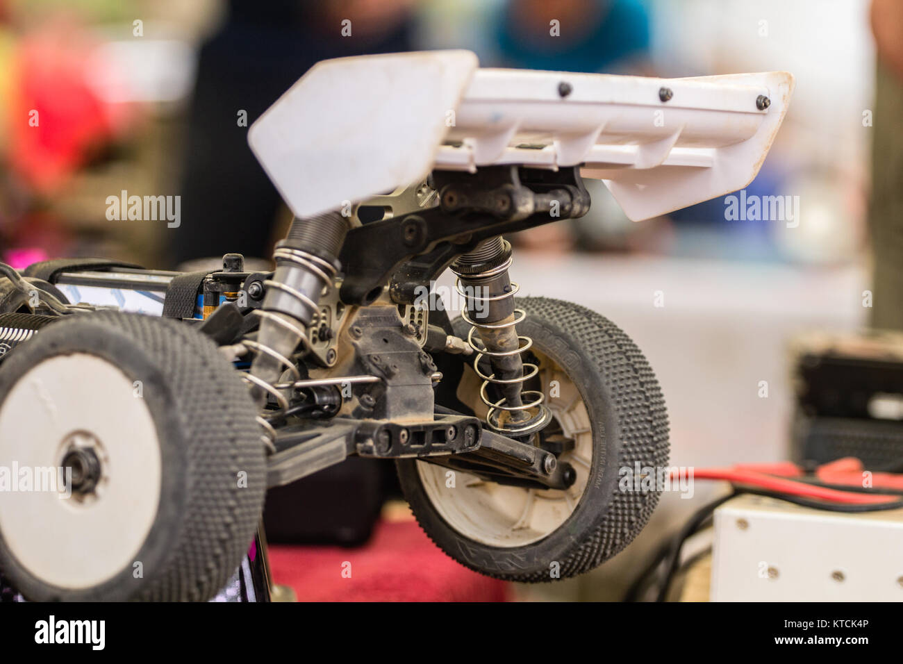 Maintenance of radio-controlled model of the car in a break between ...