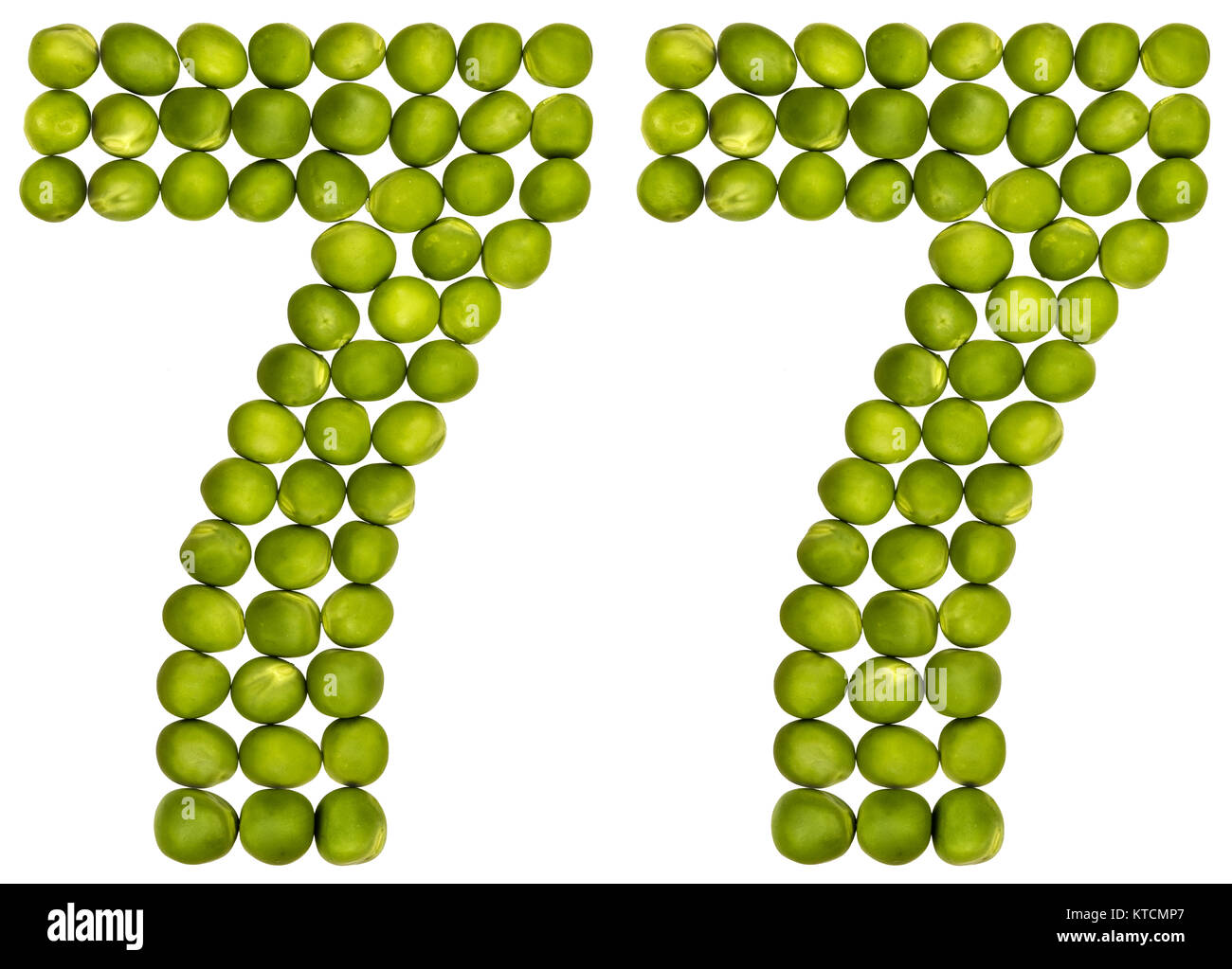 Arabic numeral 77, seventy seven, from green peas, isolated on white ...