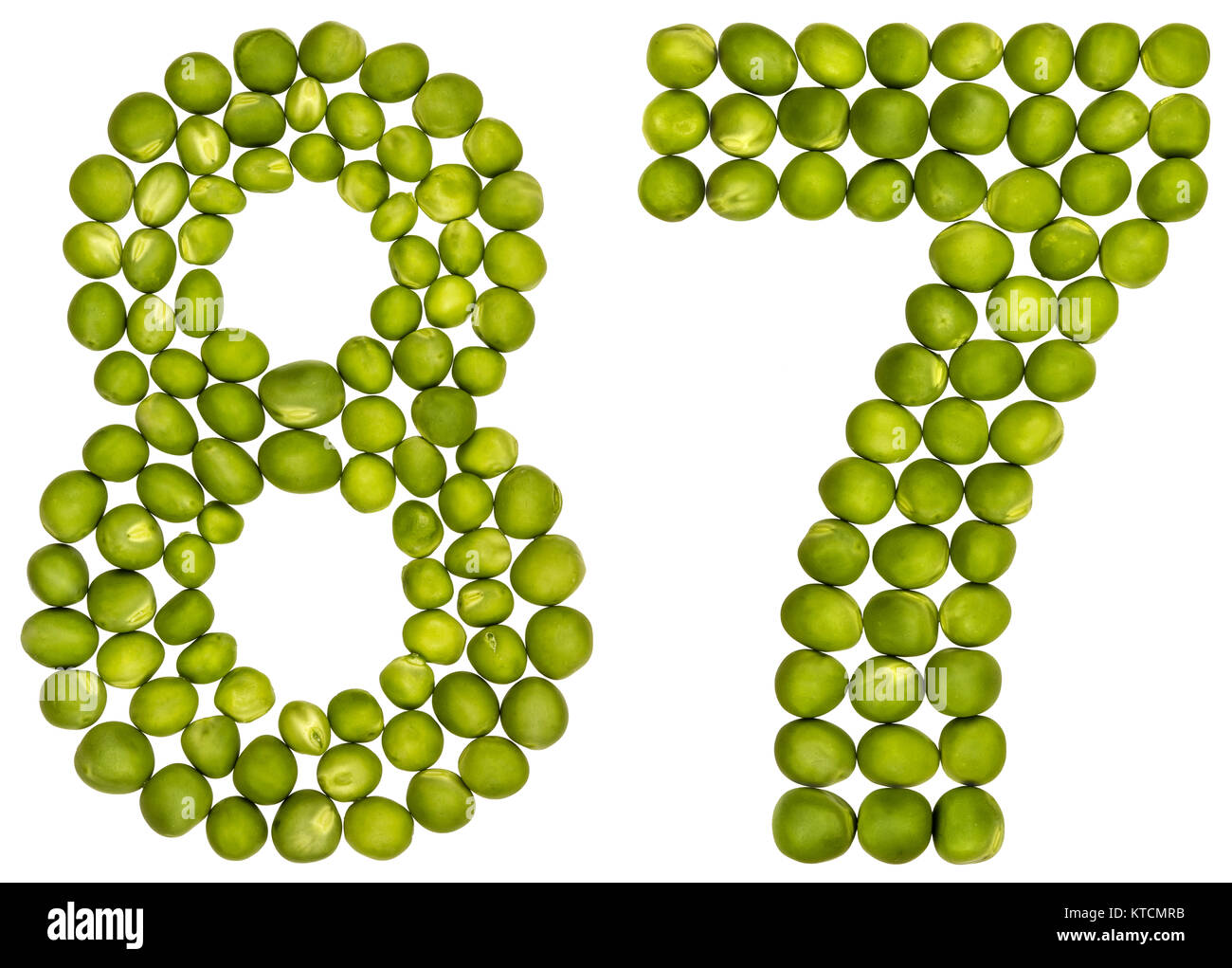Arabic numeral 87, eighty seven, from green peas, isolated on white ...