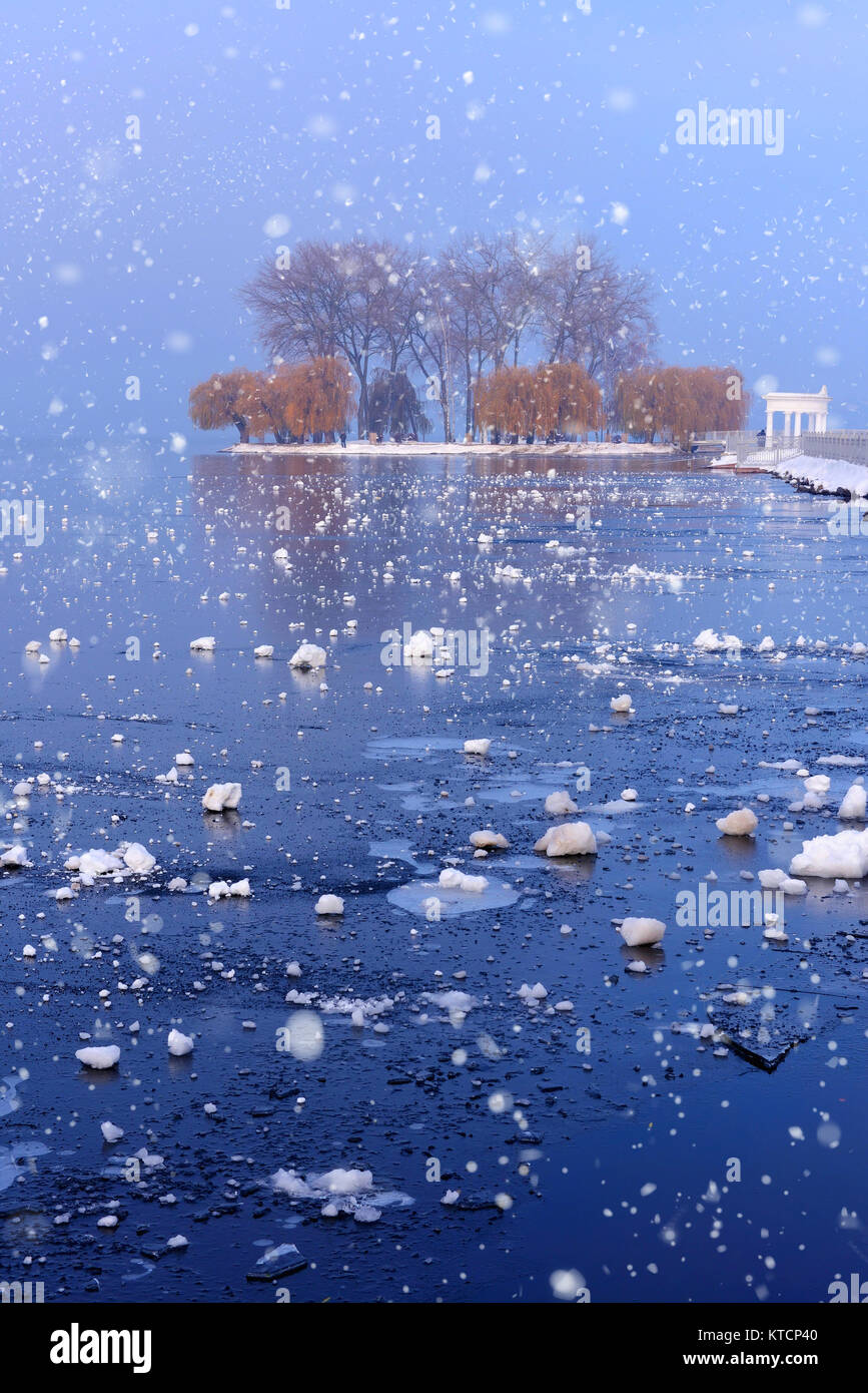 Beautiful winter landscape. Snow-covered embankment of the lake Stock ...