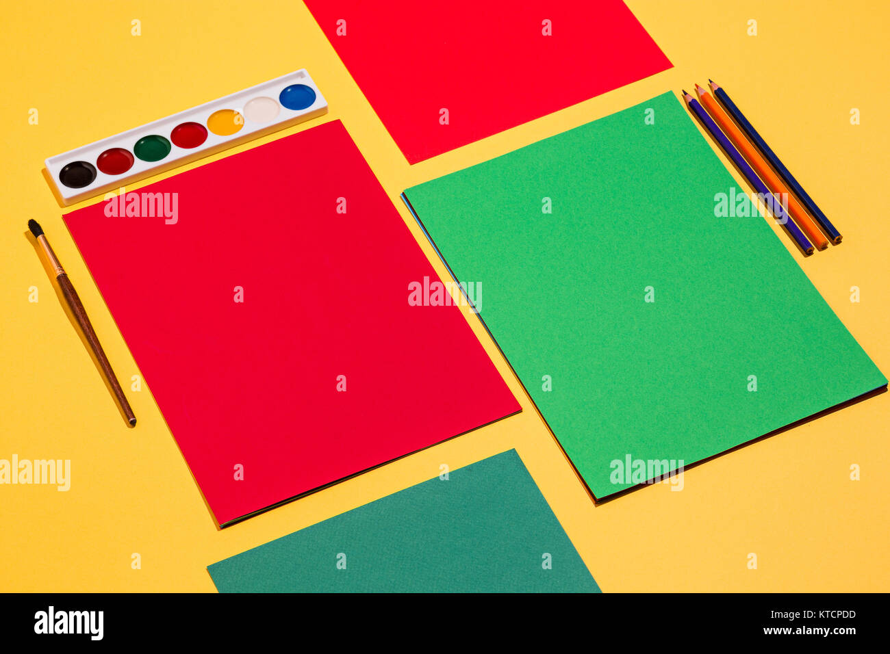 colored pencils and colour paper Stock Photo - Alamy