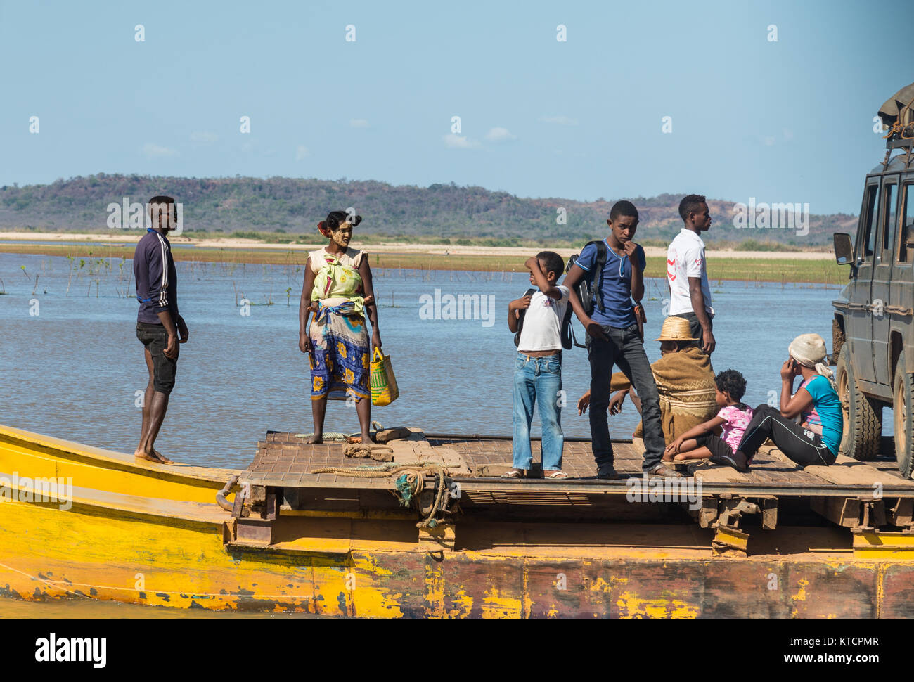 Local Malagasy passengers boarded on a ferry boat on Mania River ...