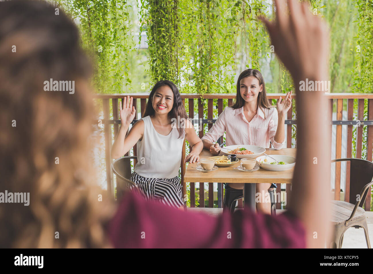 Waving Hands To Their Friends High Resolution Stock Photography and ...