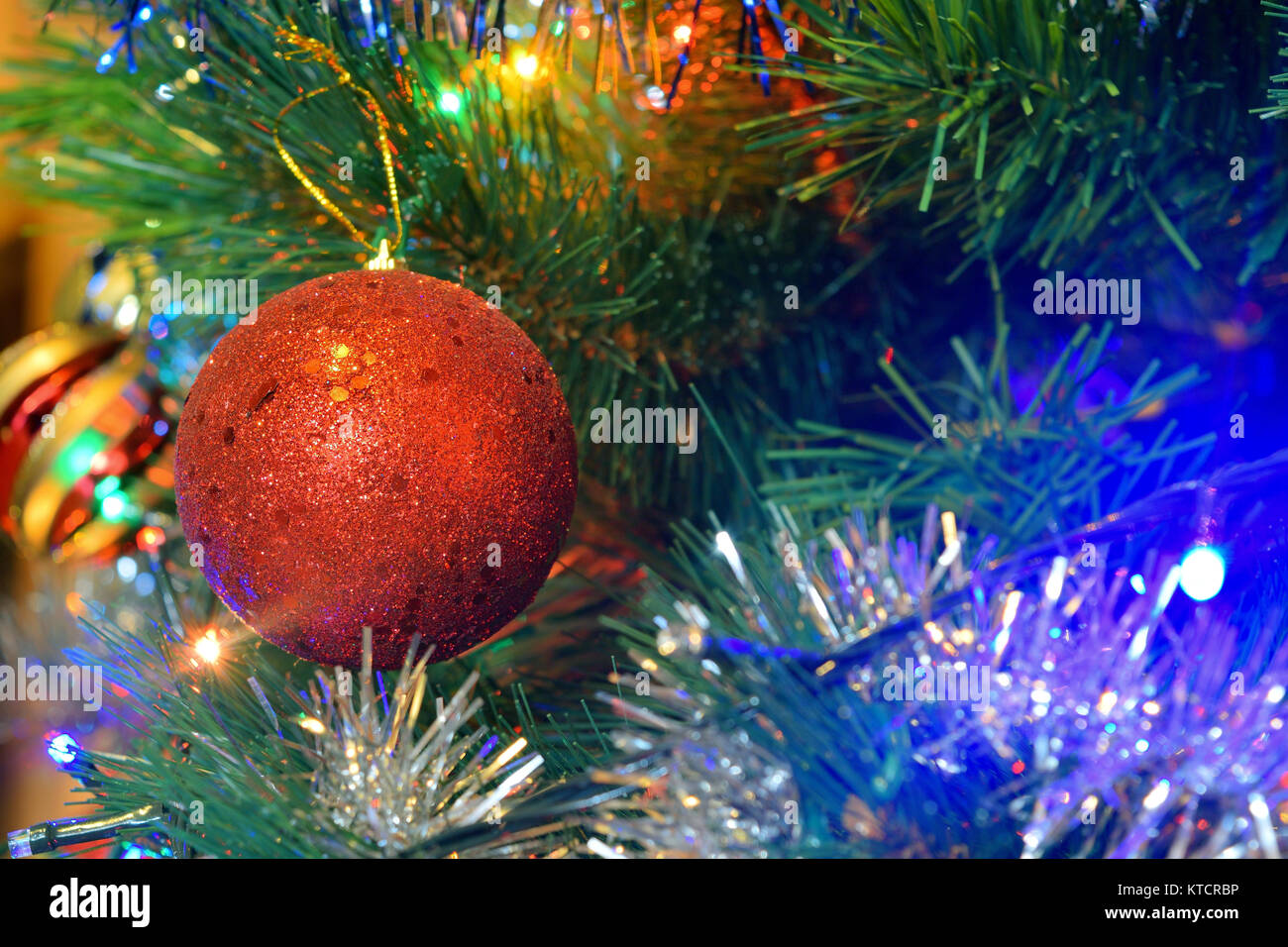 christmas balls on tree with lights and stars Stock Photo - Alamy