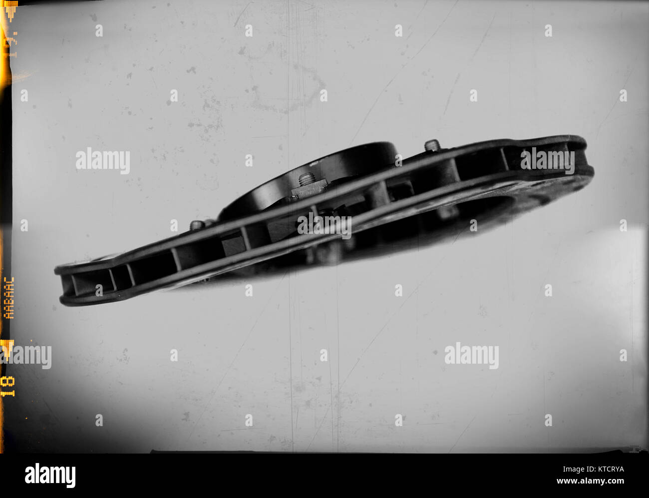 Broken, cracked and warped racing brake rotor. Analog filter applied ...