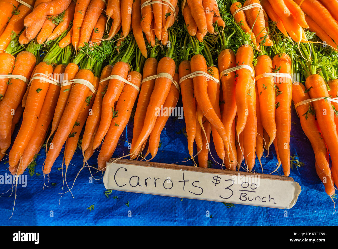 Carrots for sale at a vendor's stall at the Santa Barbara farmer's ...