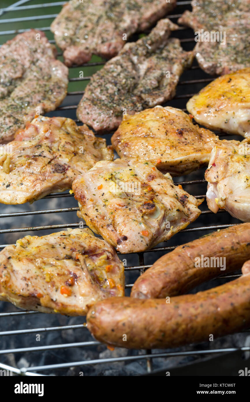 barbecue with delicious grilled meat on grill Stock Photo - Alamy