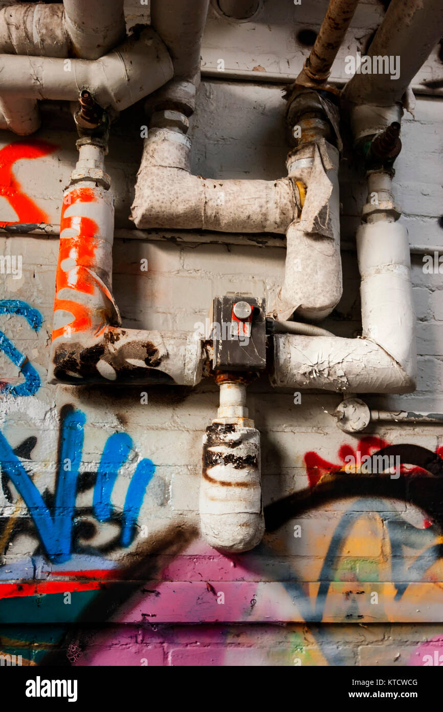 Graffiti over pipes hi-res stock photography and images - Alamy