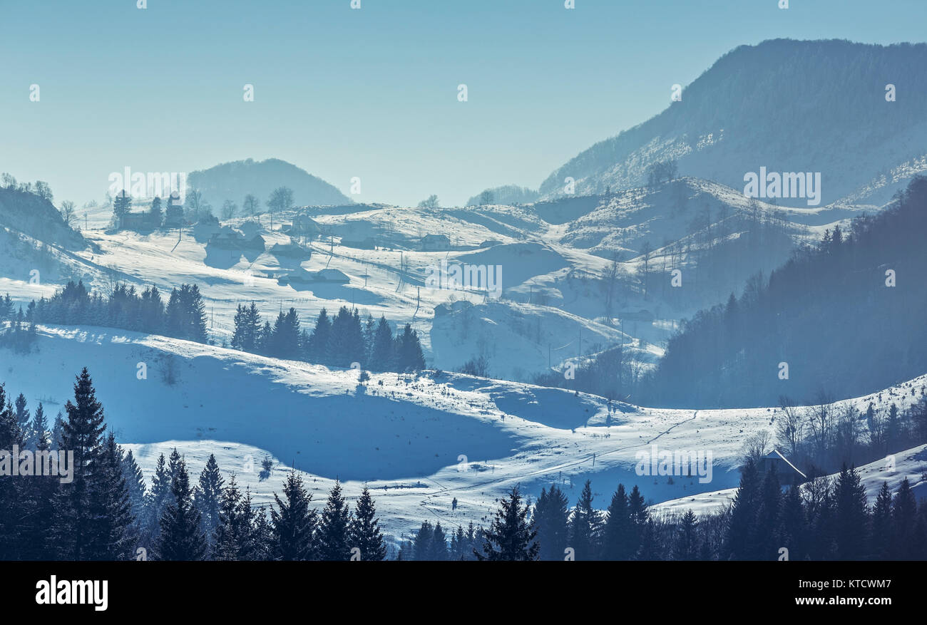 Picturesque winter landscape with the snowy Rucar-Bran pass in the ...