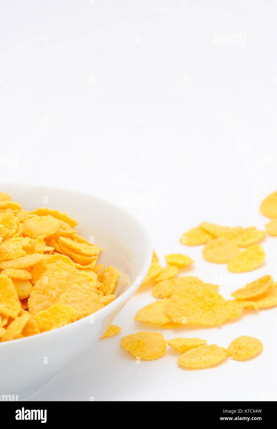 Gold corn flakes Stock Photo - Alamy