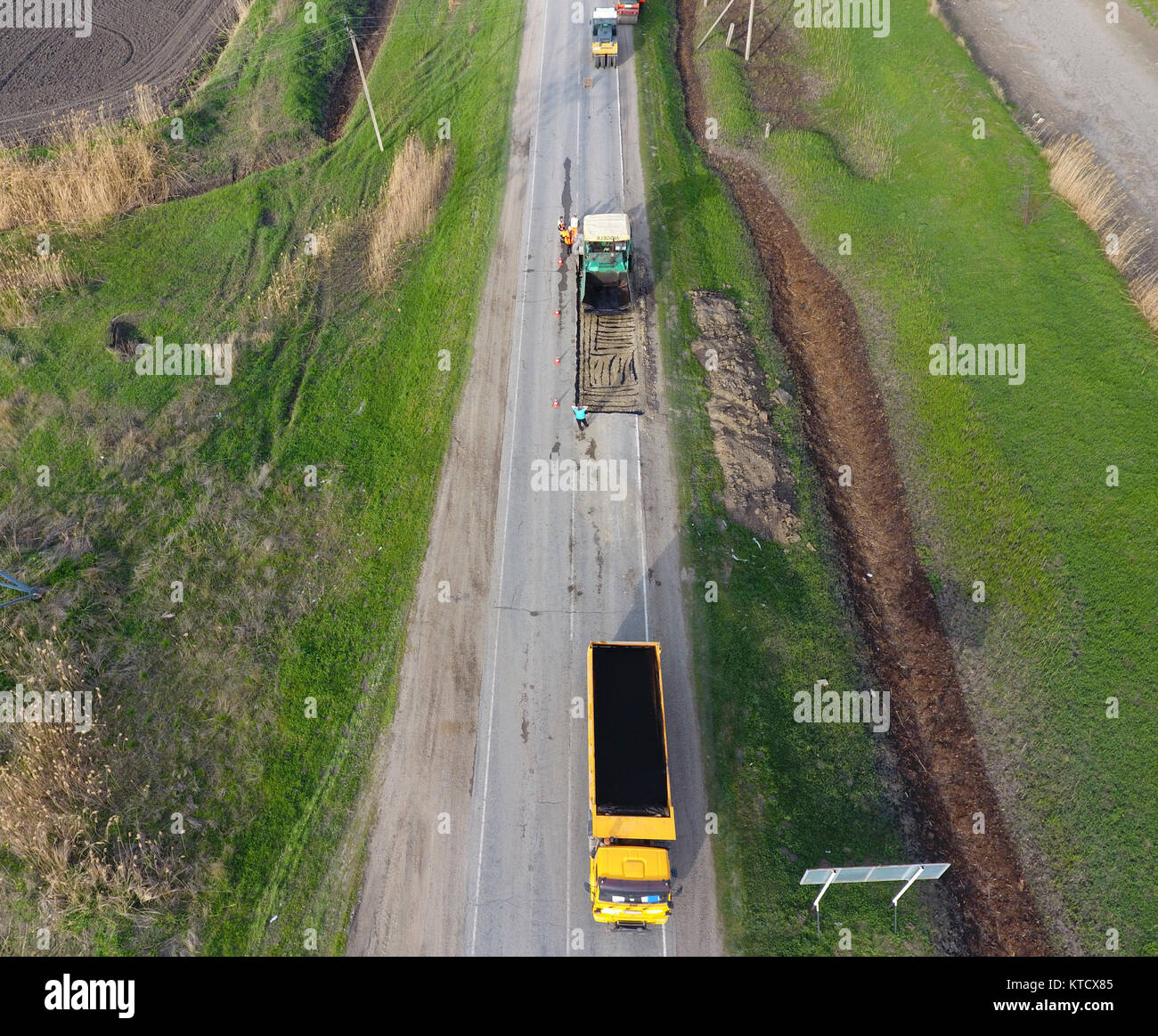 Top view of the road repair. Technics for repair of asphalt ...