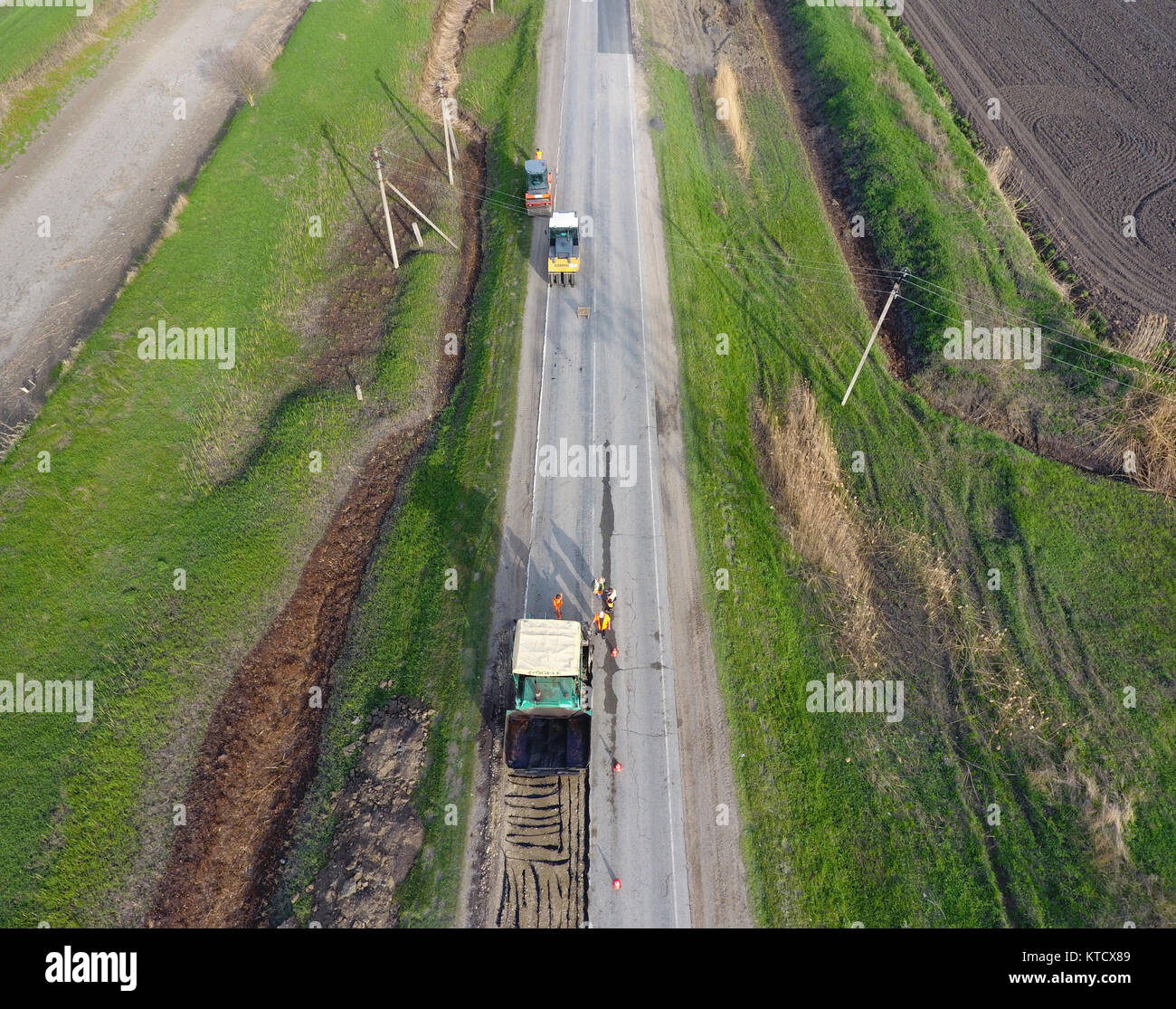Top view of the road repair. Technics for repair of asphalt ...