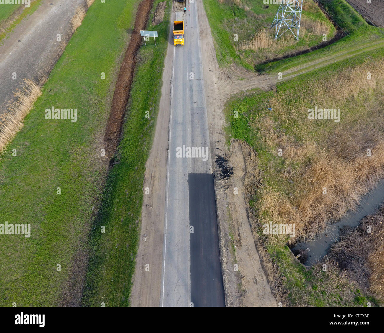 Top view of the road repair. Technics for repair of asphalt ...