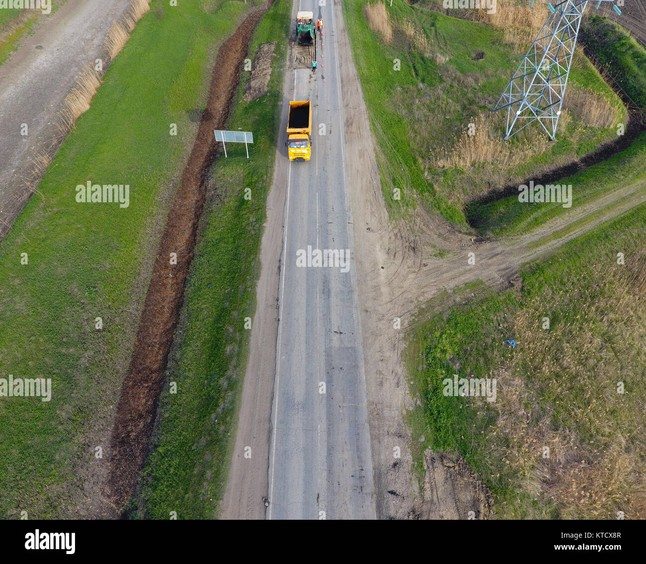 Top view of the road repair. Technics for repair of asphalt ...