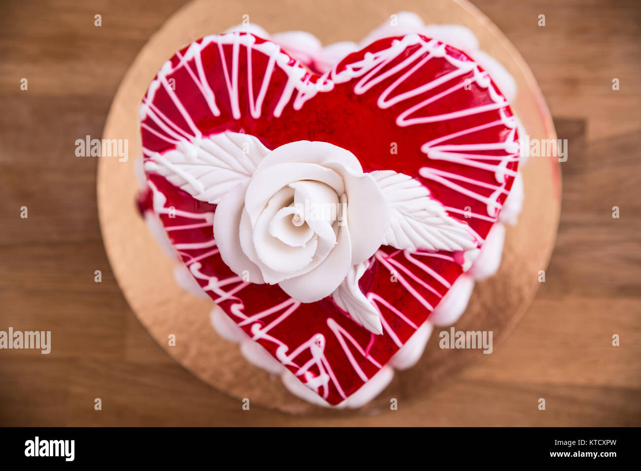 Red Heat Shaped Cake Stock Photo - Alamy