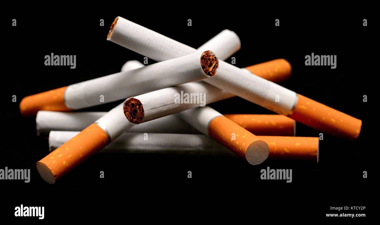 Pile of cigarettes Stock Photo - Alamy