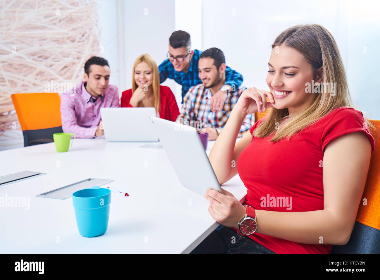 young startup people group in modern office have team meeting and brainstorming while working on ...
