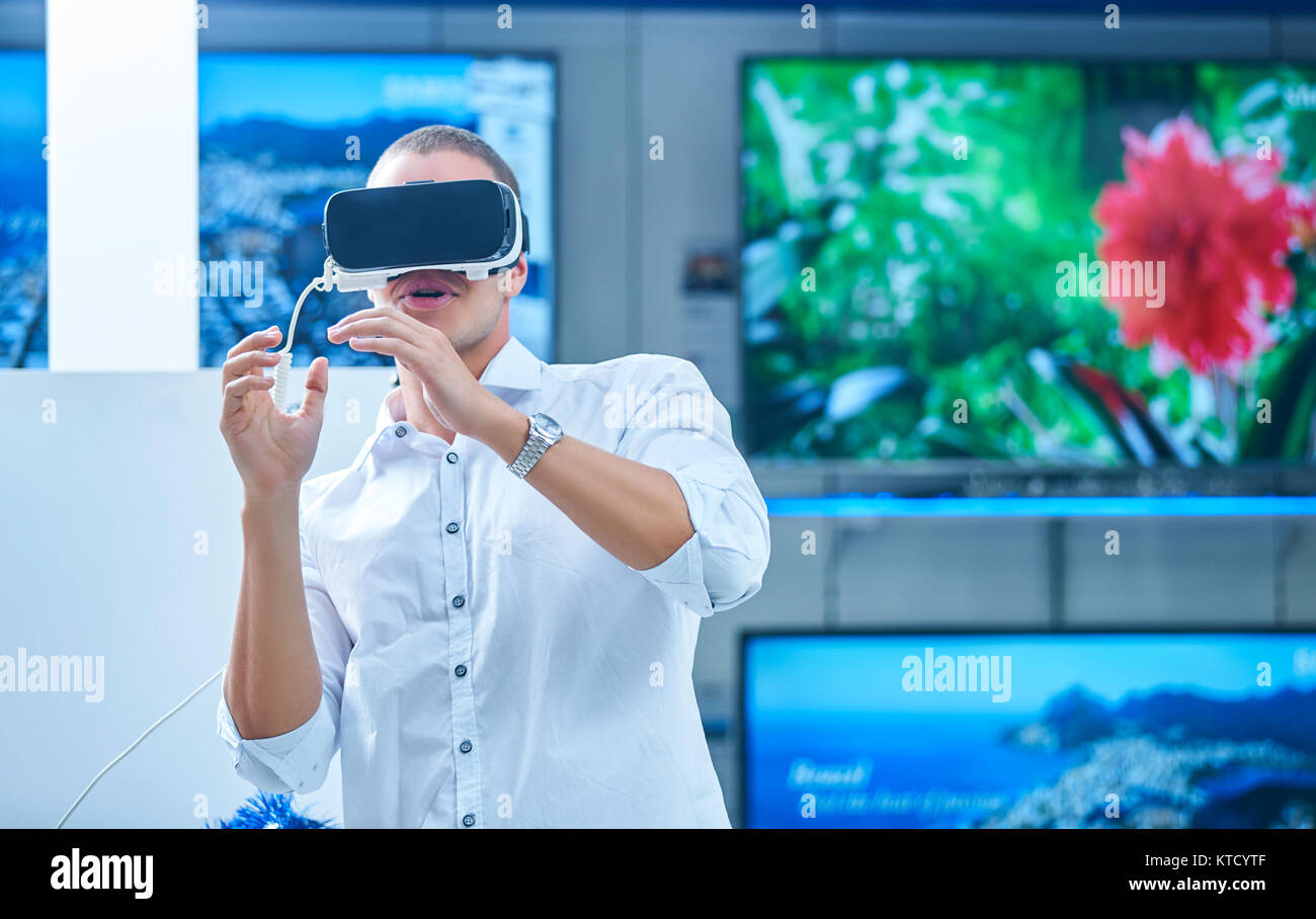 Man wearing virtual reality goggles Stock Photo - Alamy