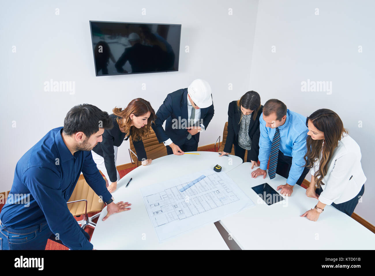 Business people group on meeting with construction engineer architect ...