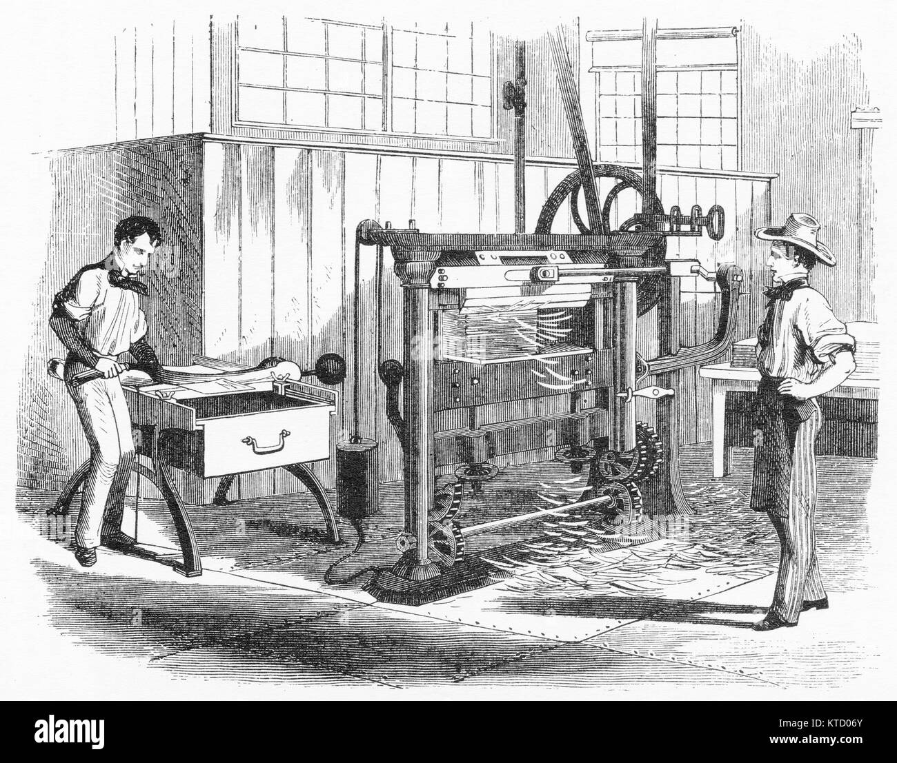 Engraving of workers operating a paper guillotine at a printing company ...