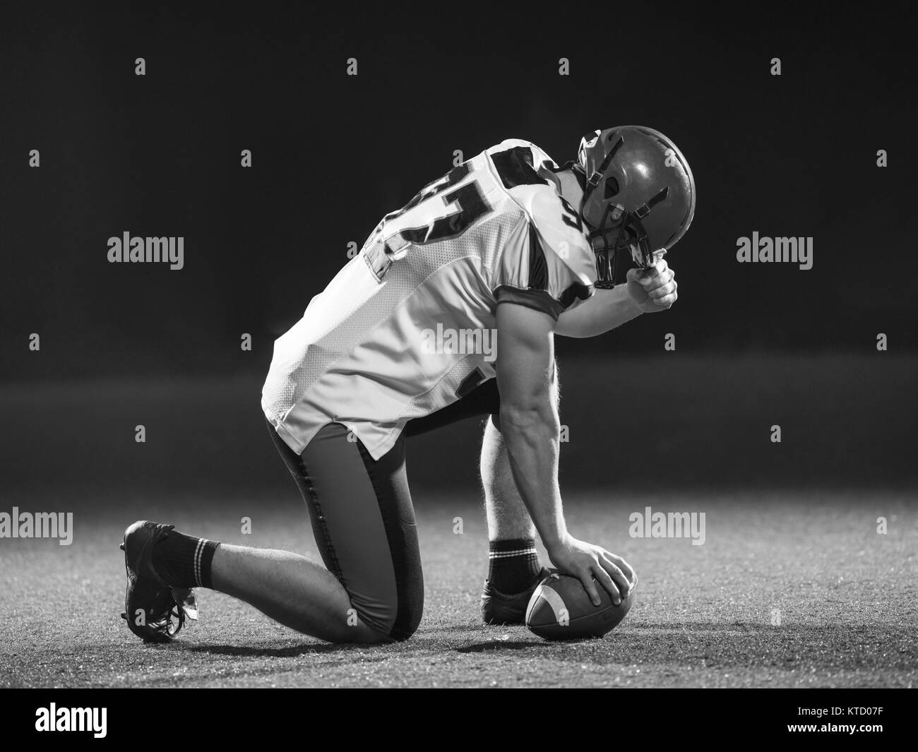 American football player starting football game on american football ...