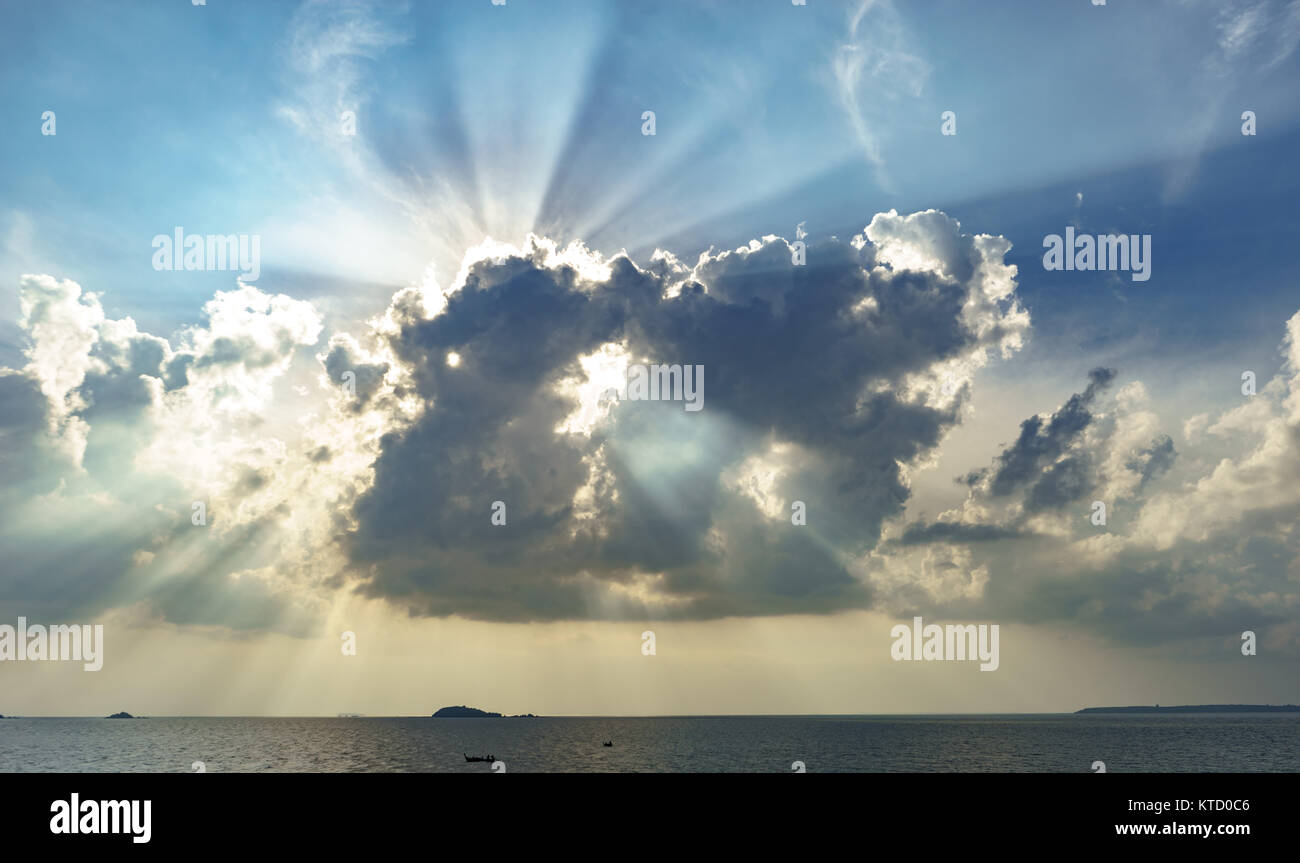 Sun light through the clouds Stock Photo - Alamy