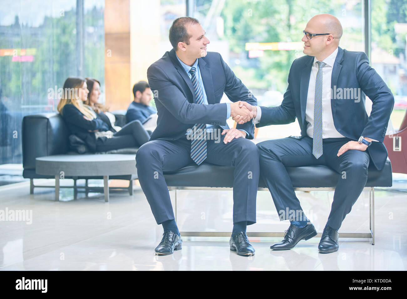 Business people shaking hands, finishing up a meeting in office Stock ...