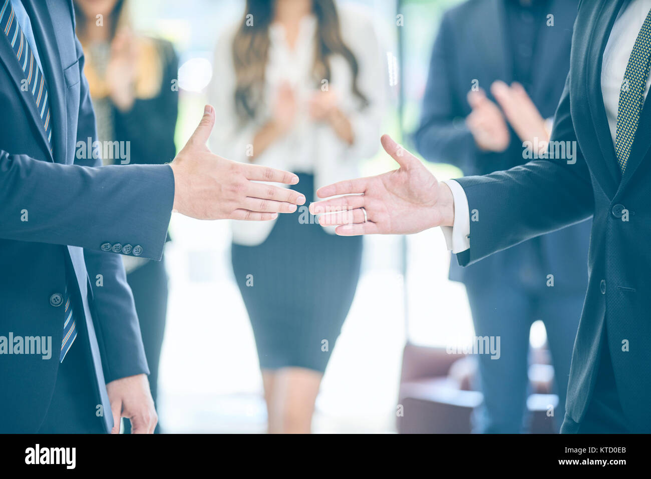 Business people shaking hands, finishing up a meeting in office Stock ...
