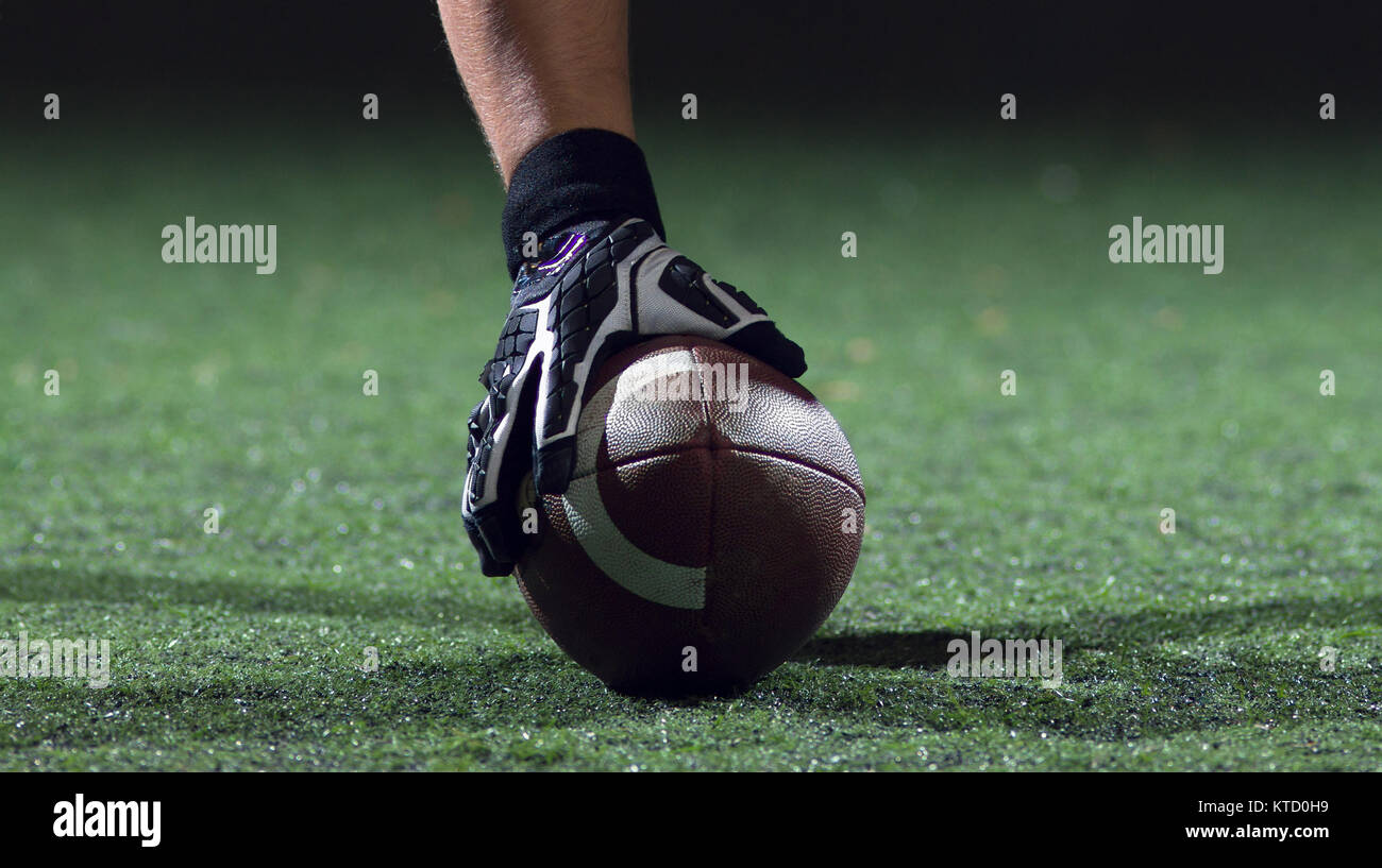 American football player starting football game on american football ...