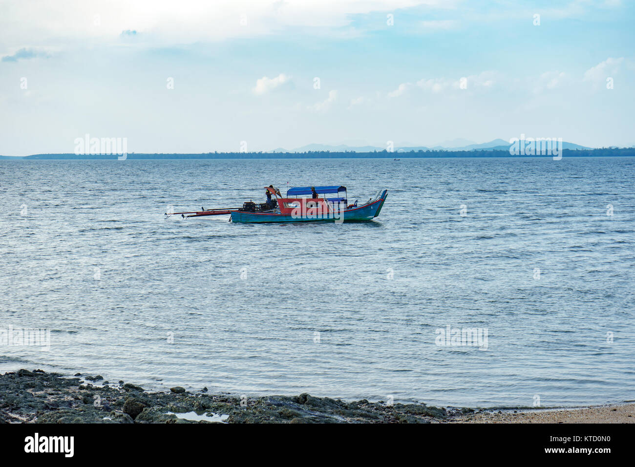 The small boat on the ocean Stock Photo - Alamy