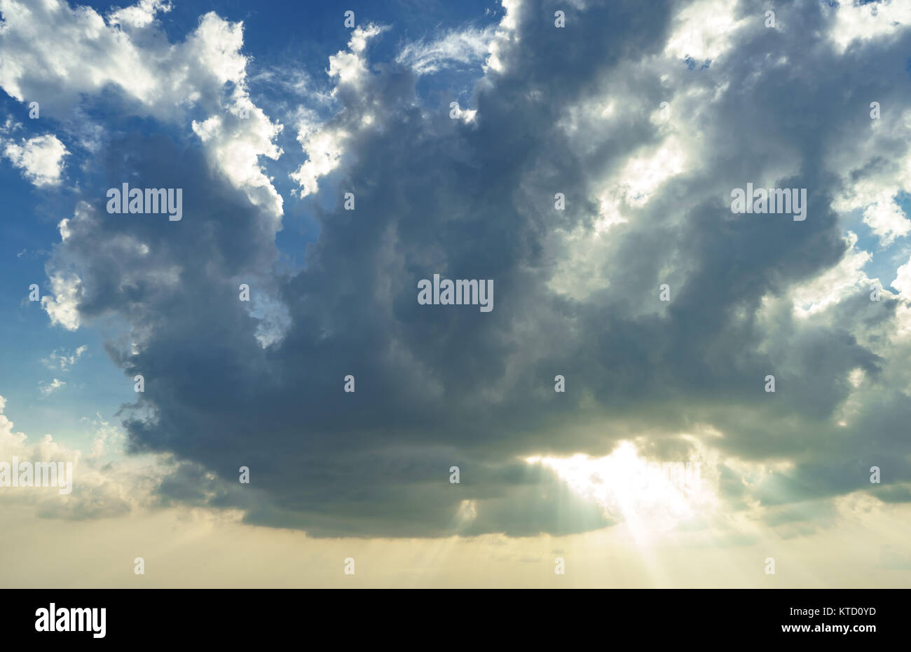 Sun light through the clouds Stock Photo - Alamy