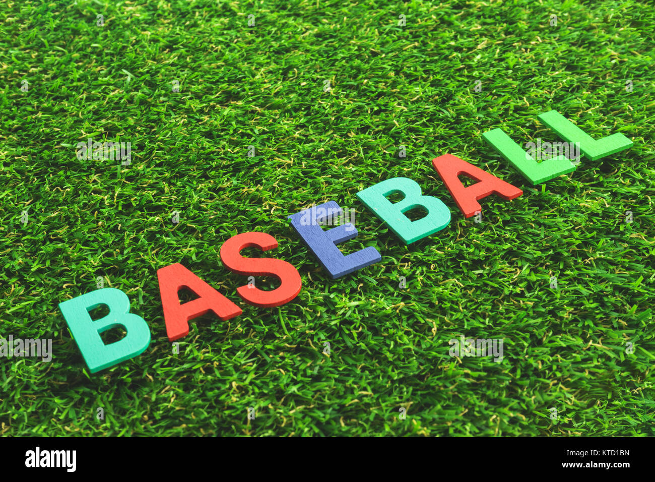 Colorful Wooden Alphabet Word Baseball on green grass background Stock ...