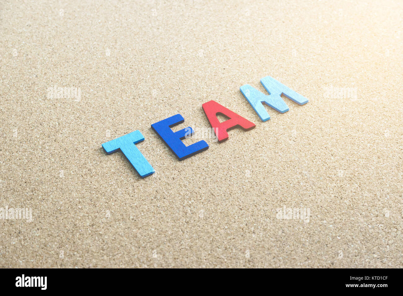 Colorful Wooden Alphabet Word Team on wooden background Stock Photo - Alamy