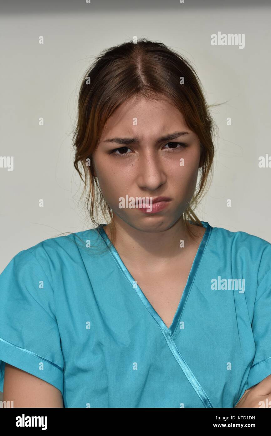 Unhappy Young Female Nurse Stock Photo - Alamy