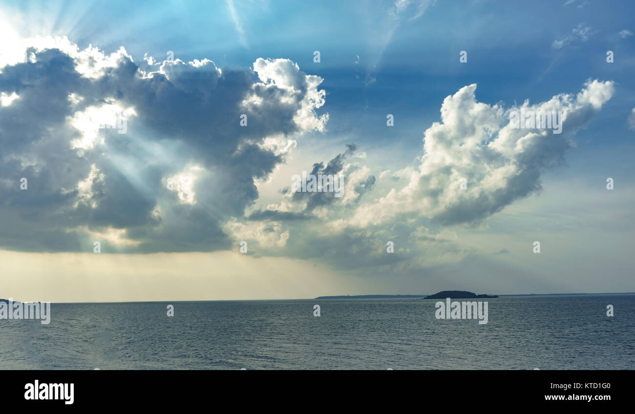 Sun light through the clouds Stock Photo - Alamy