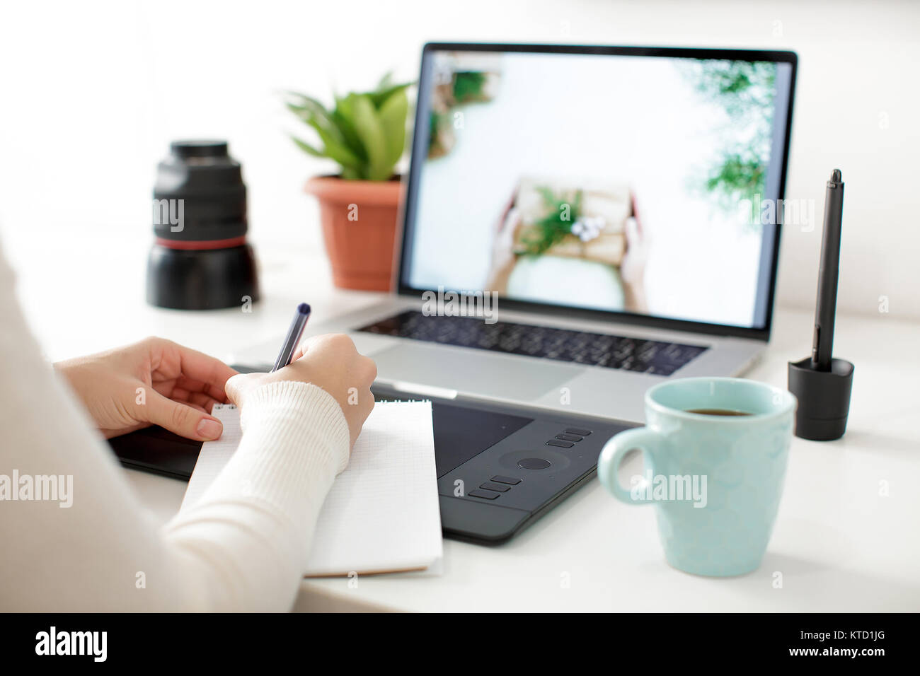 Female editor using stylus hi-res stock photography and images - Alamy