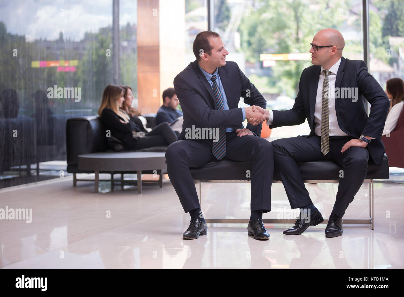 Business people shaking hands, finishing up a meeting in office Stock ...