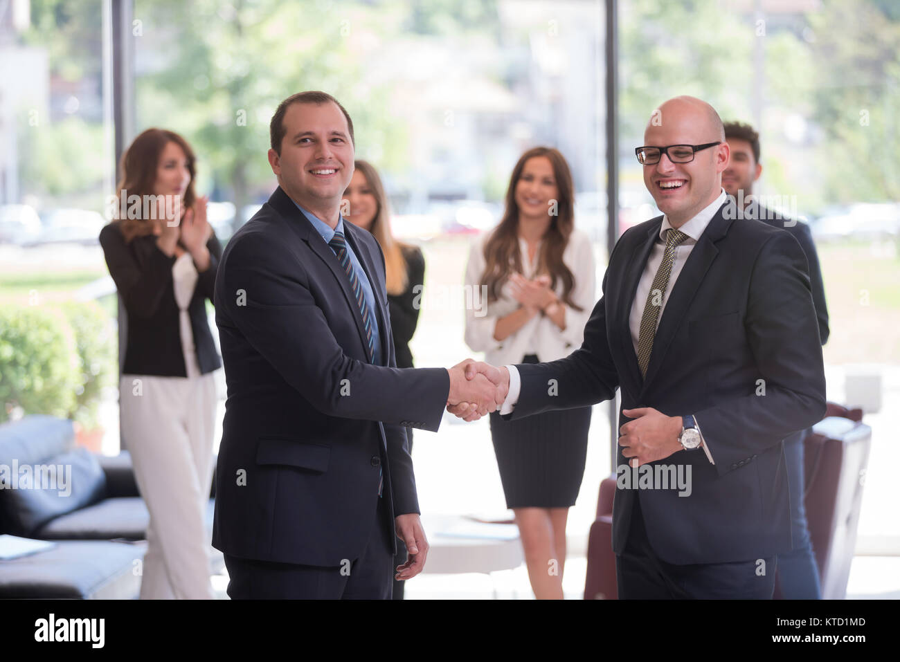 Business people shaking hands, finishing up a meeting in office Stock ...
