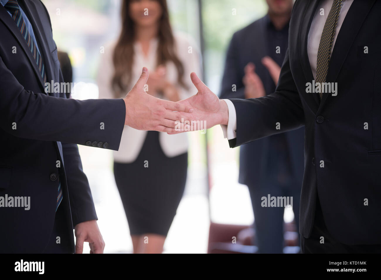 Business people shaking hands, finishing up a meeting in office Stock ...