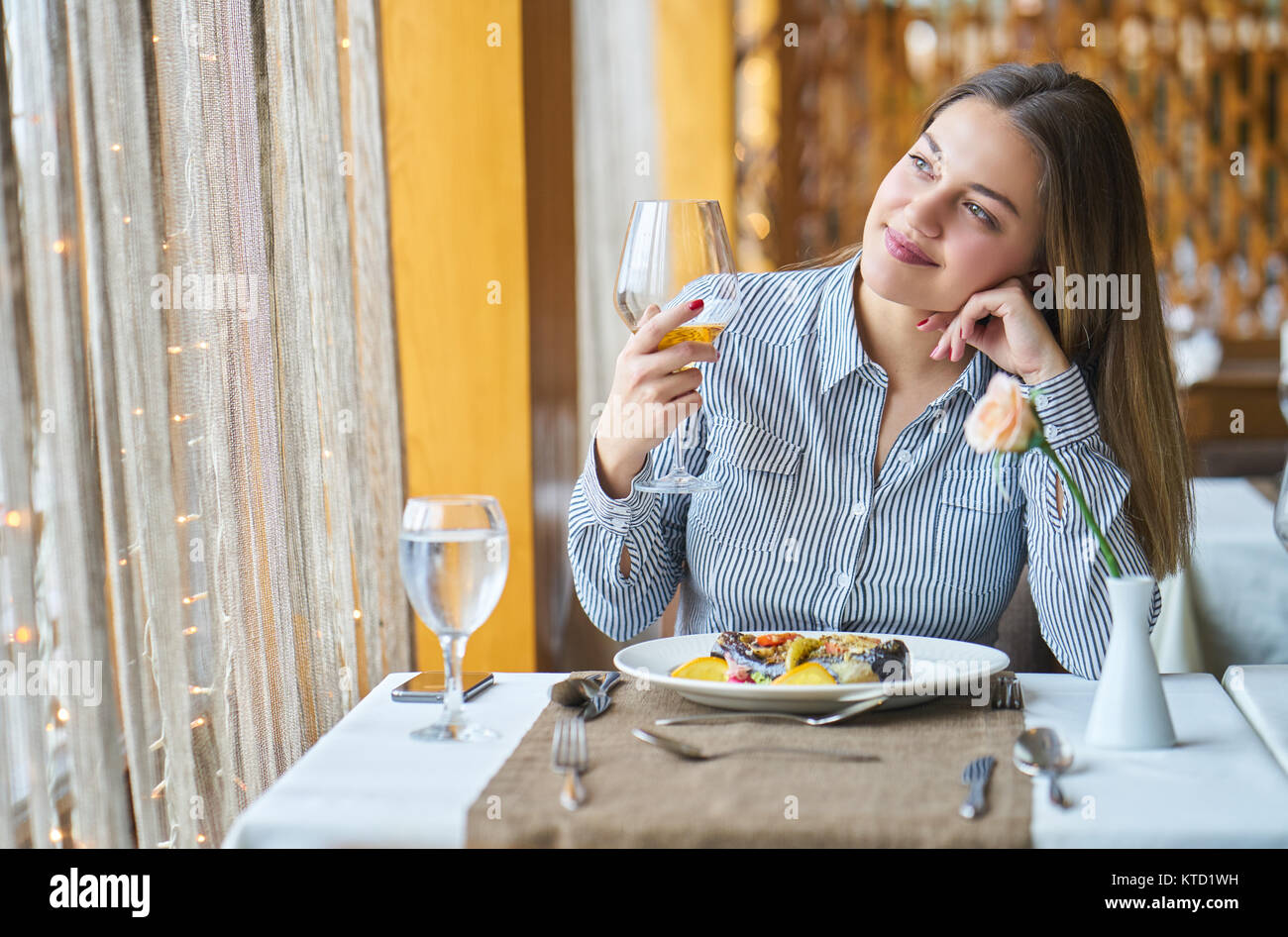 Lifestyle. Beautiful woman in modern restaurant Stock Photo - Alamy